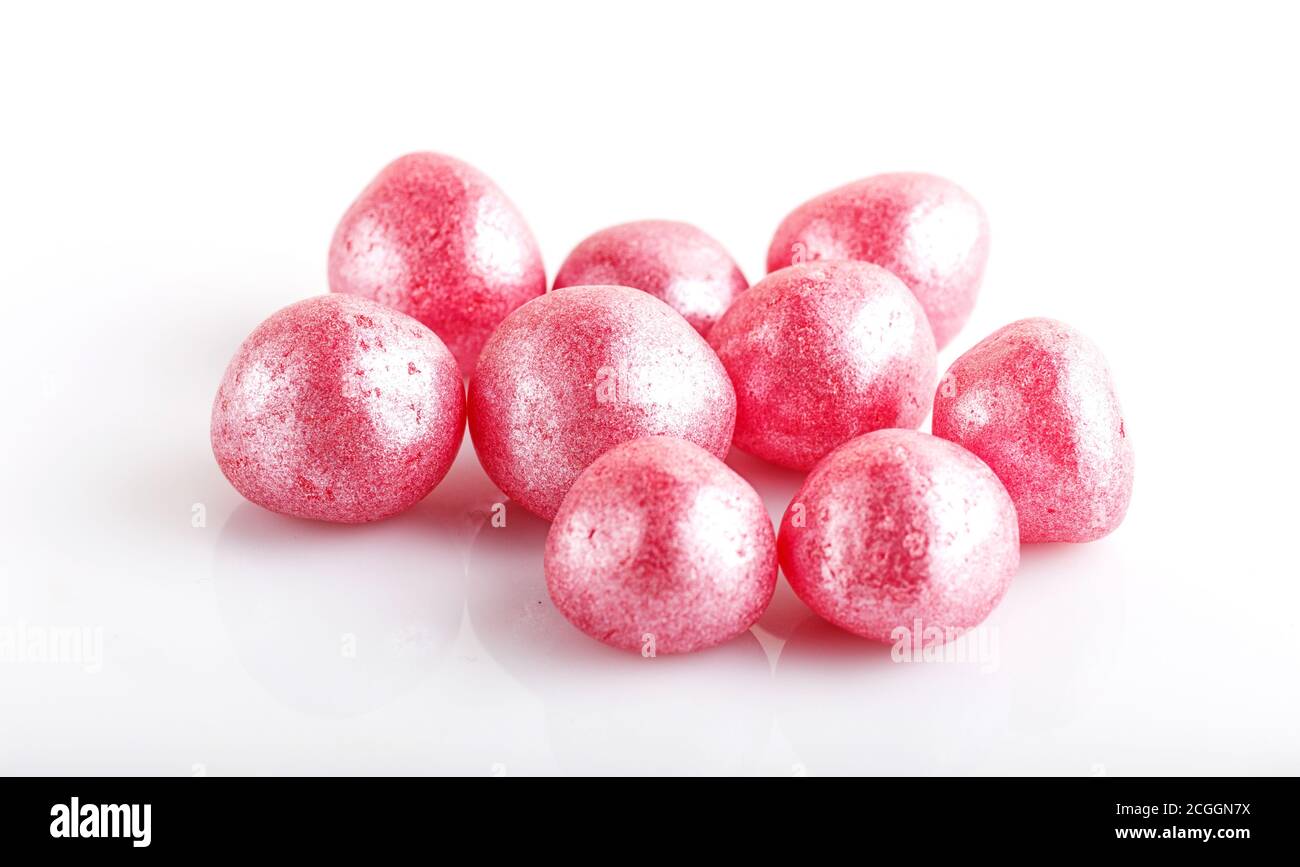 Heap of pink hard sugar candies isolated on white background Stock ...