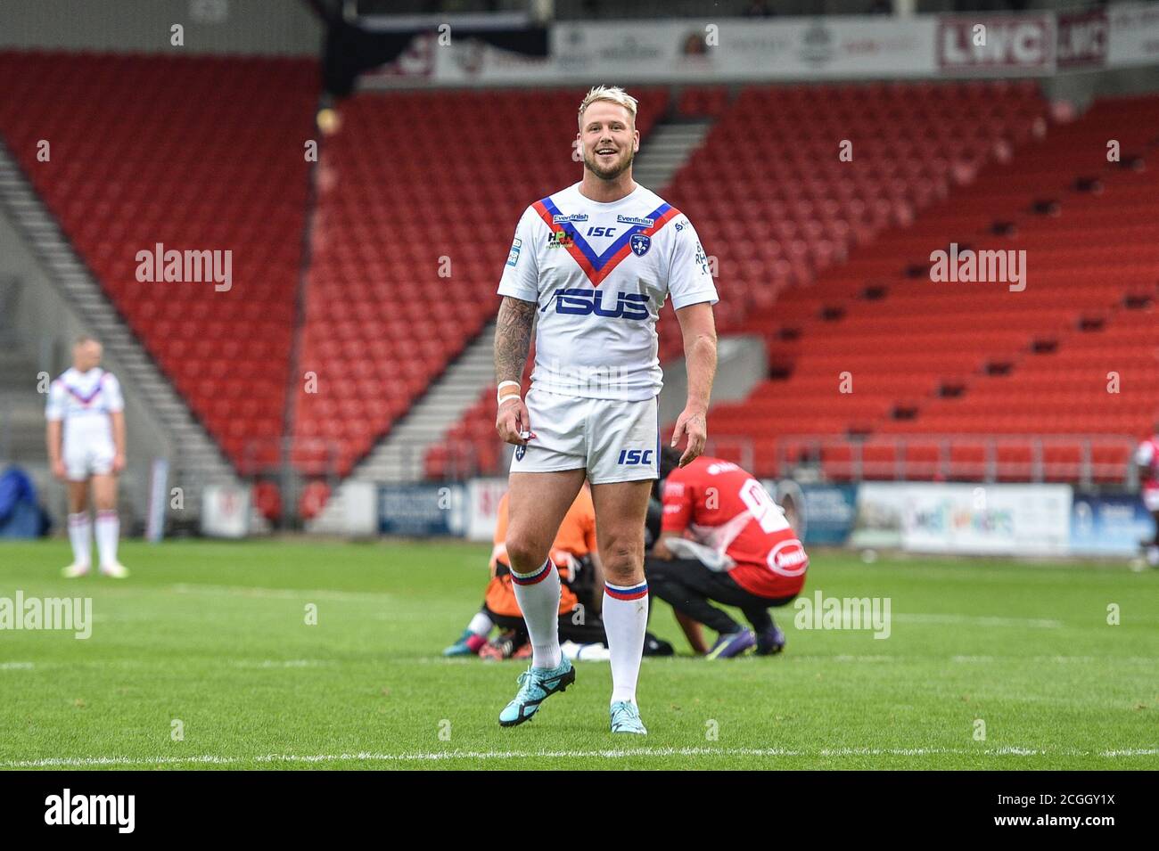 Wakefield Trinity's Joe Westerman shares a word with Jake Connor of ...