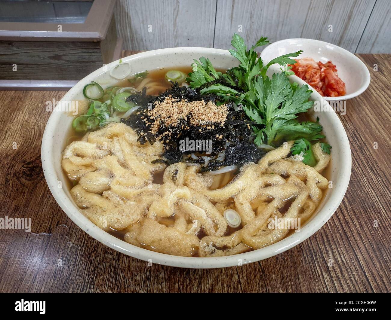 Garak-guksu, Korean variation of Japanese udon. Served with Kimchi ...