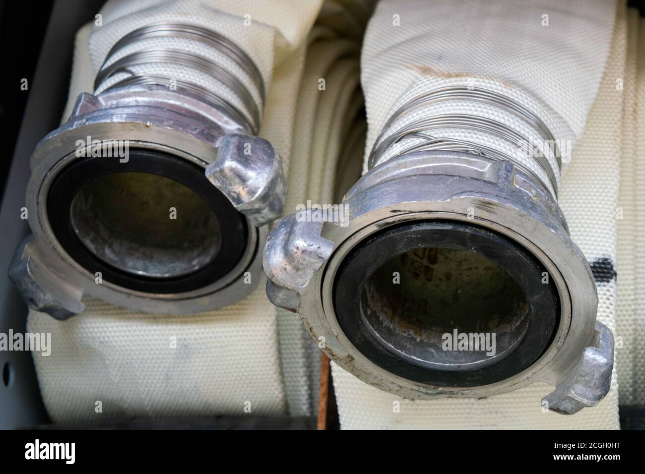 Rubber fire hose hi-res stock photography and images - Alamy