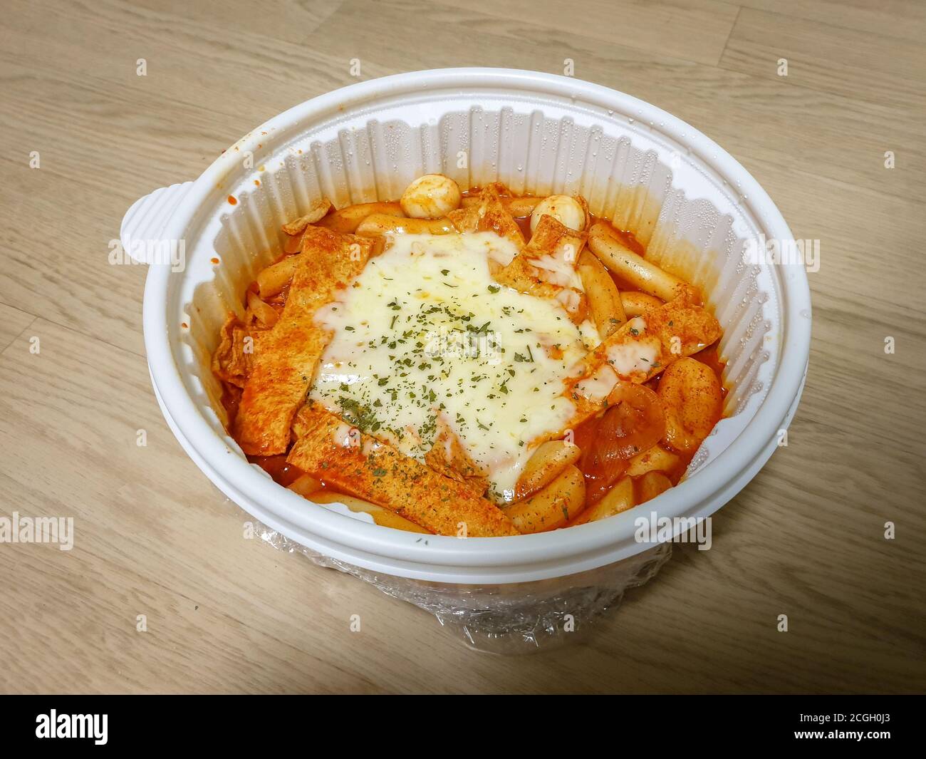 Tteok-bokki, or stir-fried rice cakes - popular Korean food made from ...