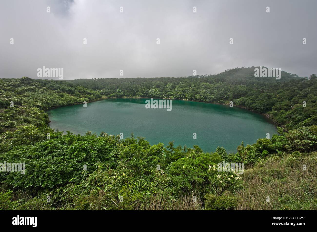 Beautiful and crystal-clear lake in the Kirishima mountains on Kyushu ...