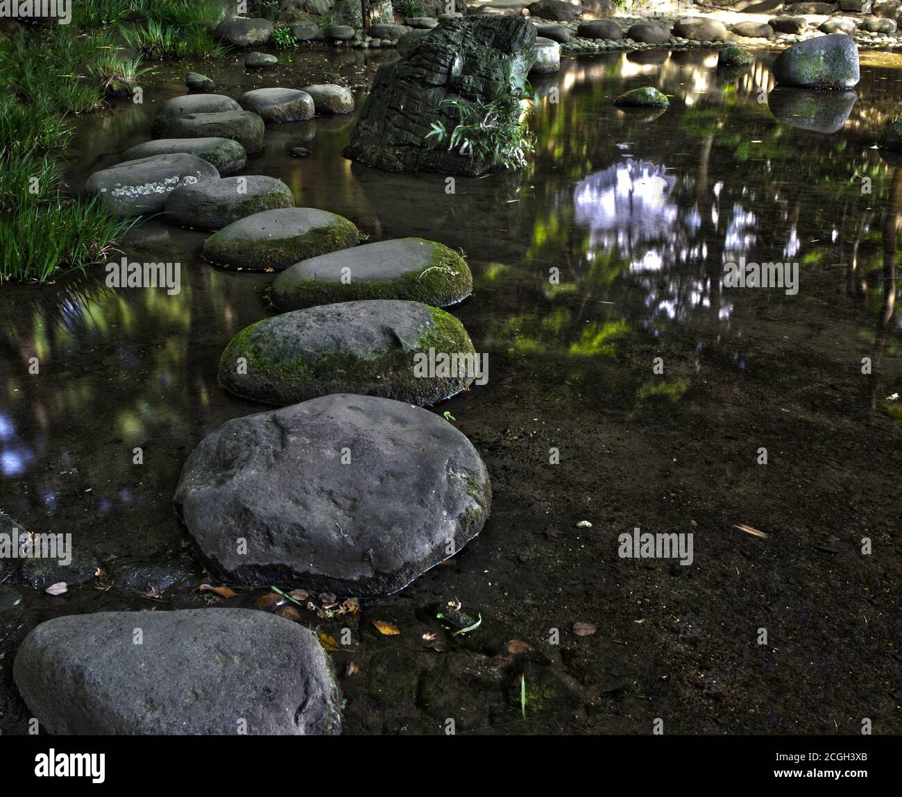 Zen stone path in a Japanese Garden Korakuen. Koishikawa Korakuen is ...