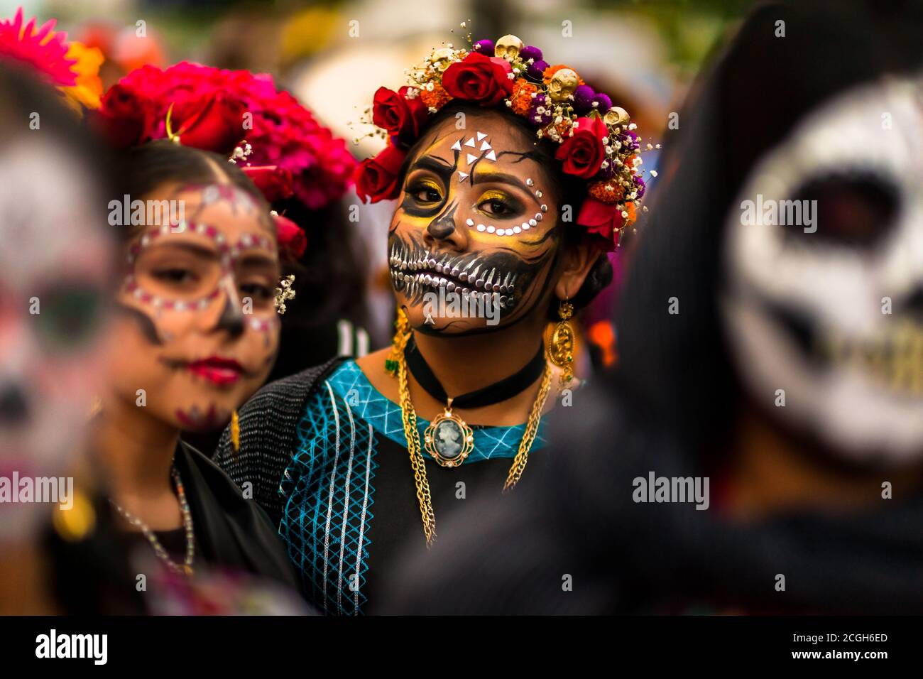 Young Mexican women, dressed as La Catrina, take part in the Day of the ...