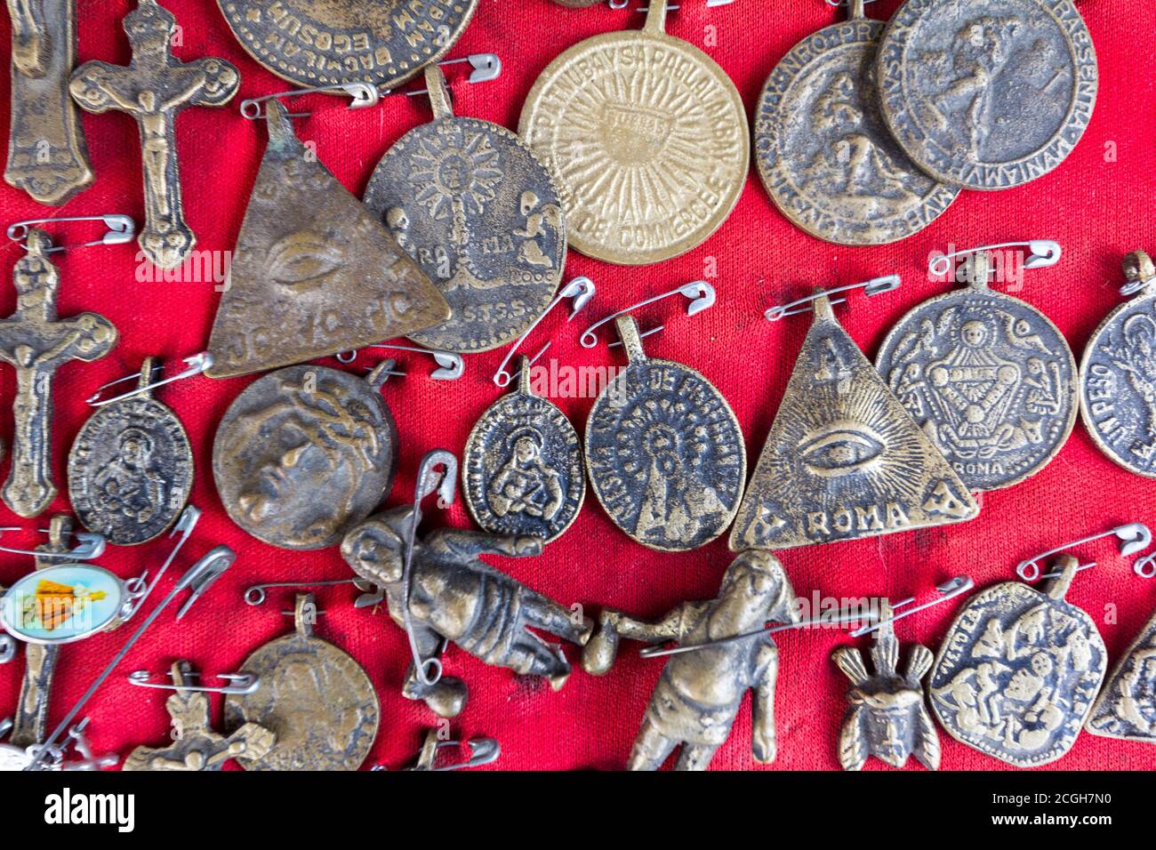 Different kinds of amulets being sold near a church in Bicol Stock ...