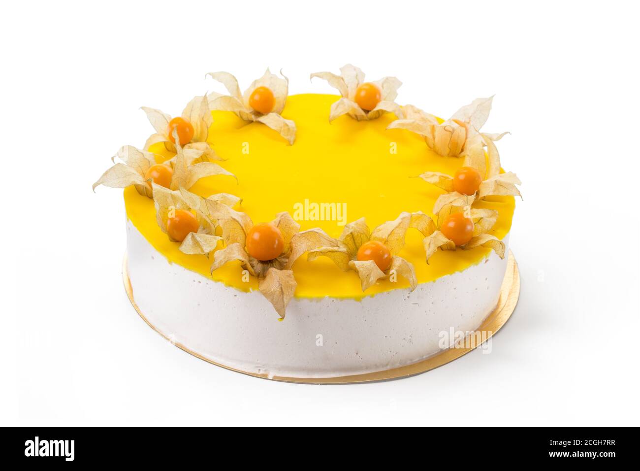 Yellow souffle cake isolated on white background Stock Photo - Alamy