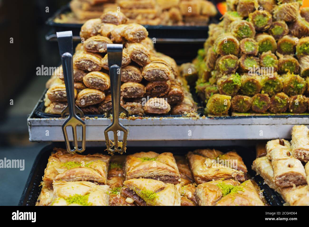 Traditional arabic sweets (dessert kadaif, kunafa, baklava) in the ...
