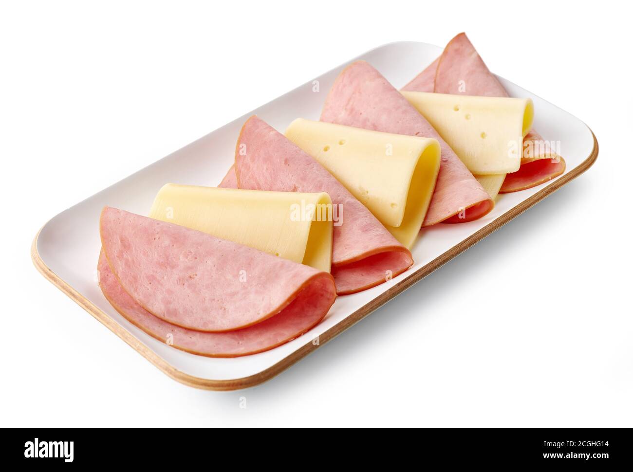 breakfast plate of cheese and ham sausage isolated on white background ...