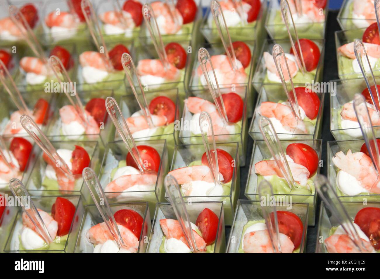 small ramekins with a cream a small tomato with a shrimp Stock Photo ...