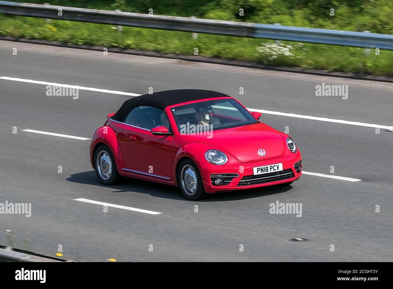 2018 red VW Volkswagen Beetle Design TSI BMT S-A driving on the M6 ...