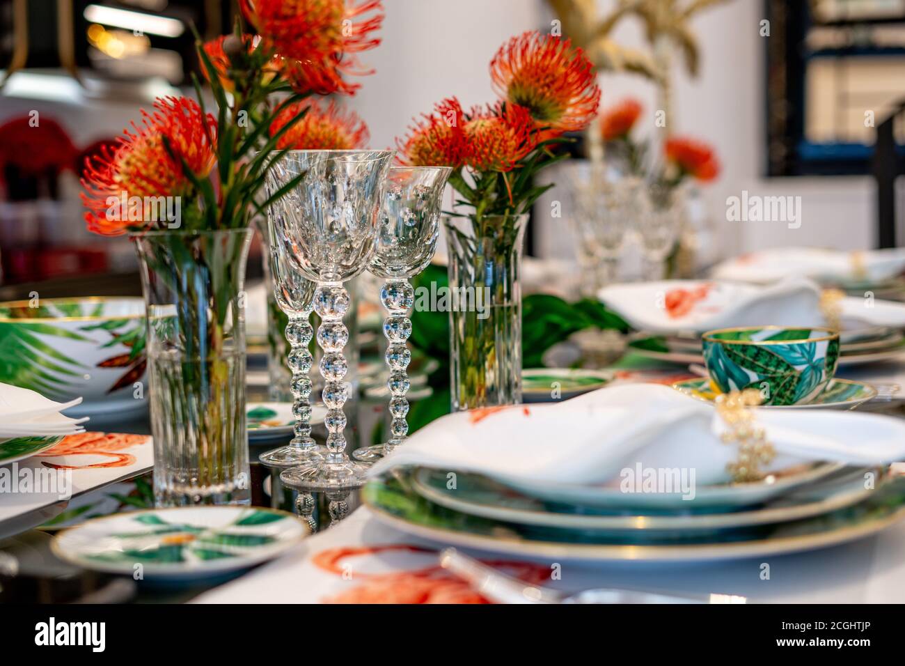 Tables set for an event party. Luxury elegant table setting dinner in a restaurant. Glasses and ...