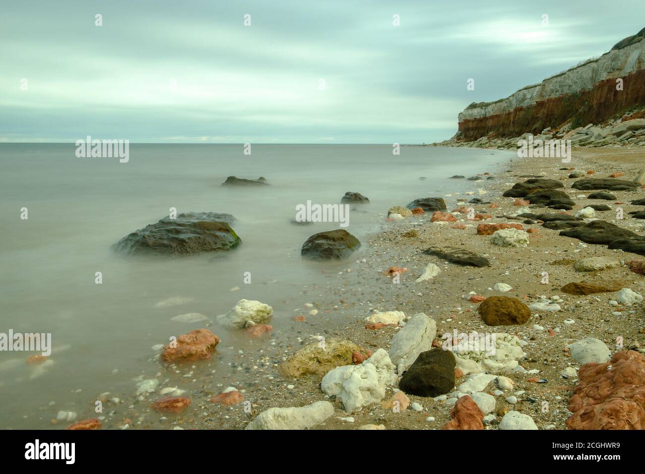 Hunstanton cliffs at high tide seen using long exposure Stock Photo - Alamy