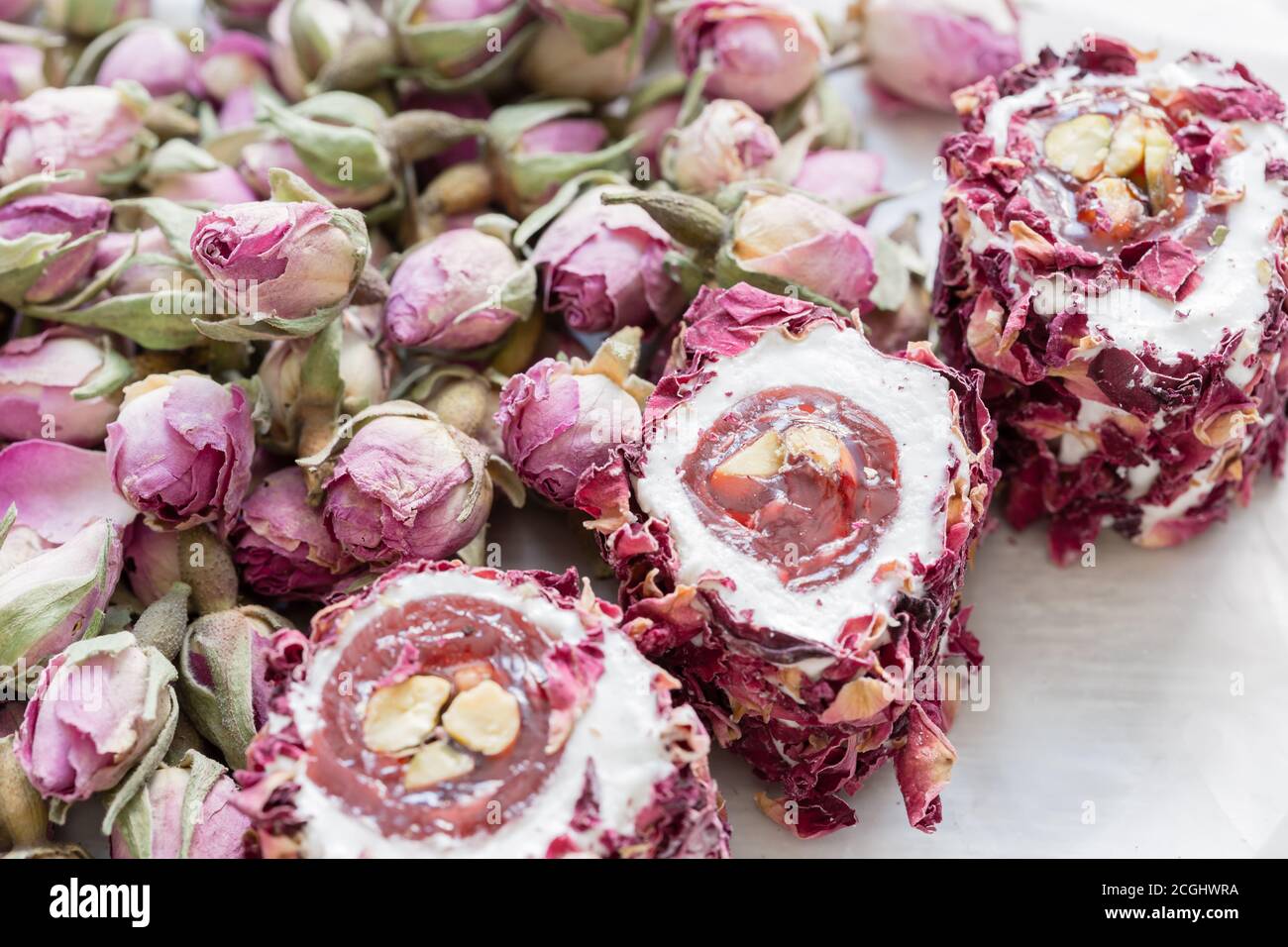 Turkish delight with nuts and rose leaves. Rahat lokum, traditional ...