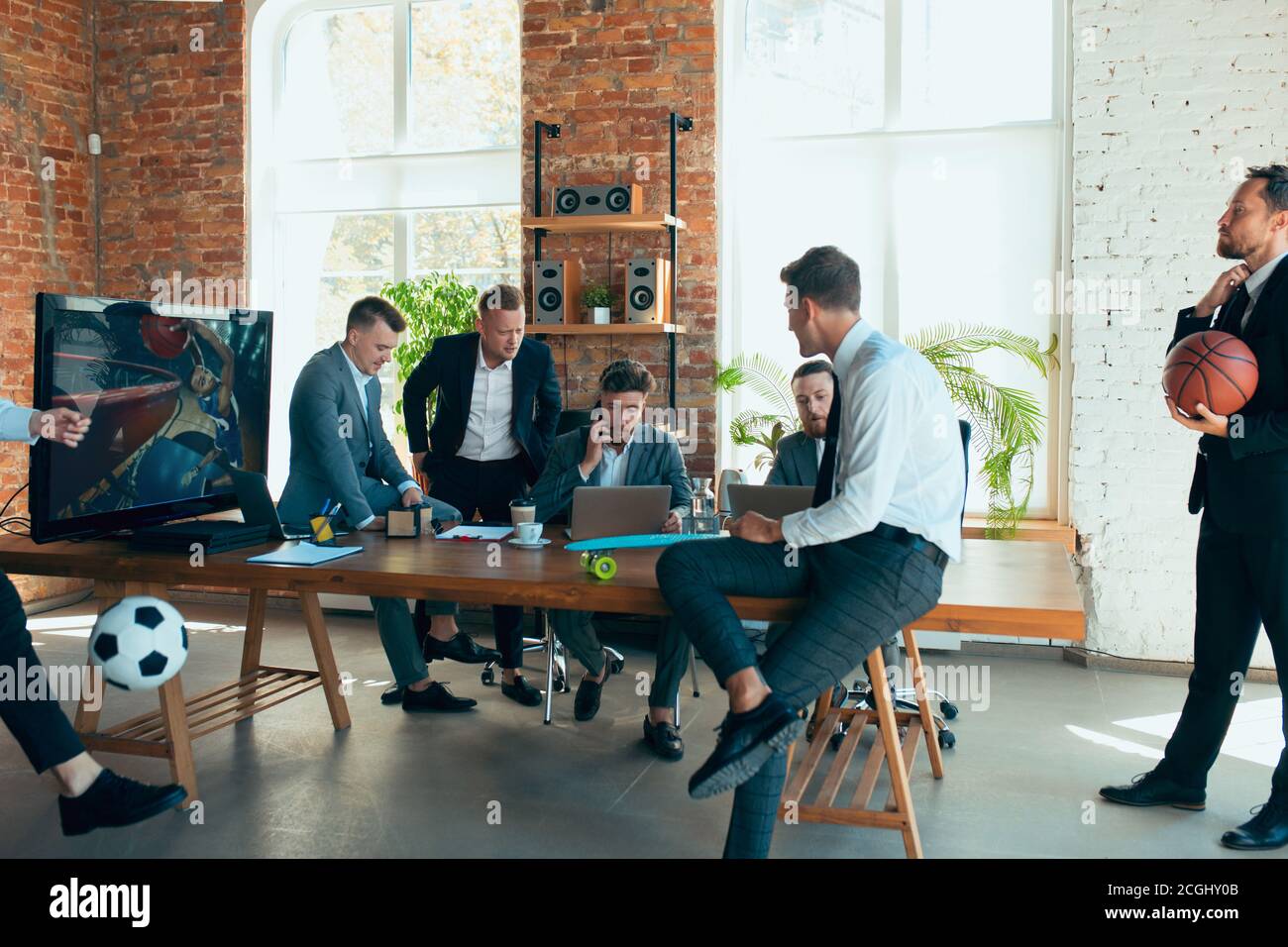 Office workers playing football hi-res stock photography and images - Alamy