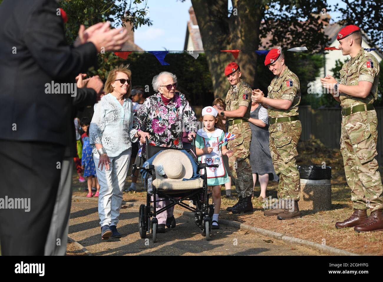 Current and former members of the military police form a guard of ...