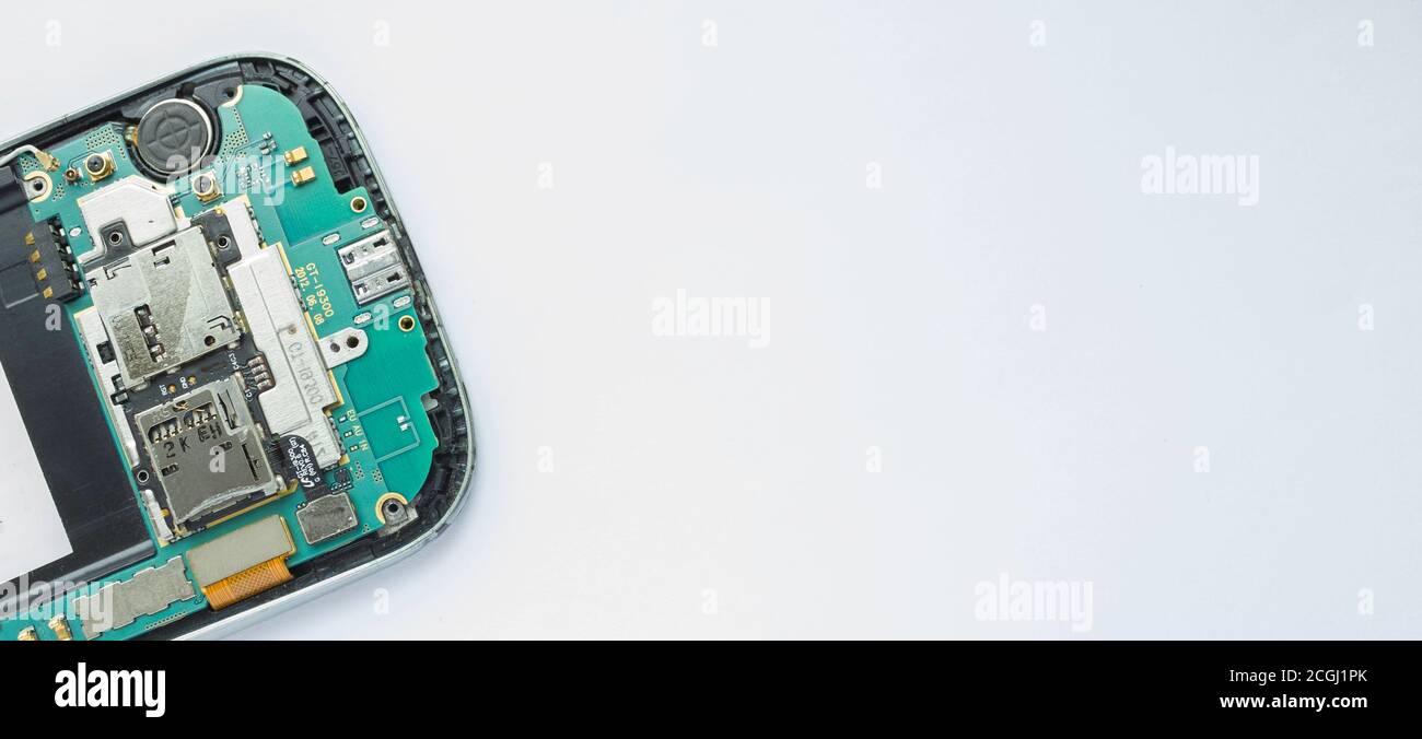 Phone repair. Electronic Board inside the phone. Close, white ...