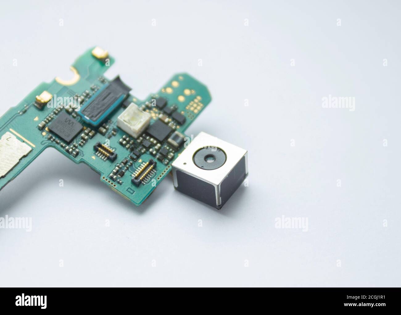 Phone repair. Electronic Board inside the phone. Close, white ...