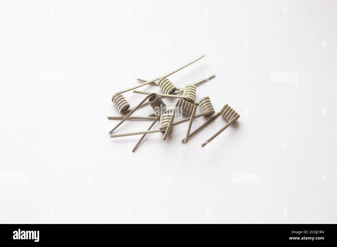 E-cigarette coils on a white background. Metal components for VAPE ...