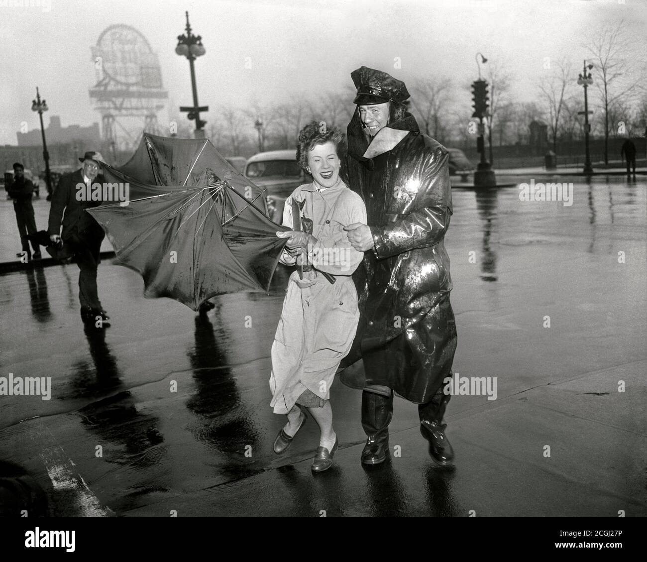 Officer rescues pedestrian with umbrella in the windy city of Chicago ...