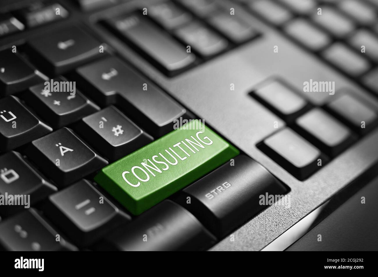 Consulting , Keyboard button Stock Photo - Alamy