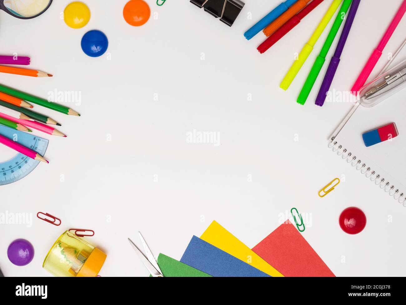 School mockup. Office supplies on a white background, free space for ...