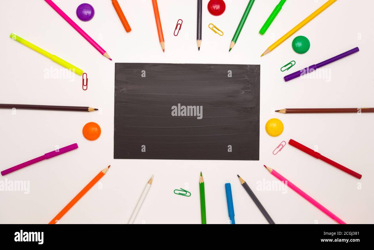 Background for school and student design. Colored pencils around a ...