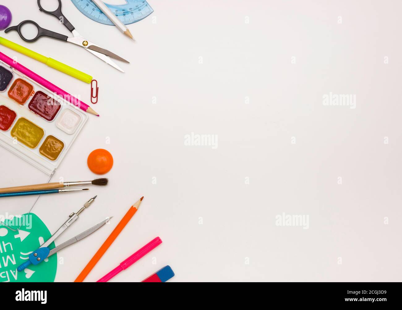 School mockup. Office supplies on a white background, free space for ...
