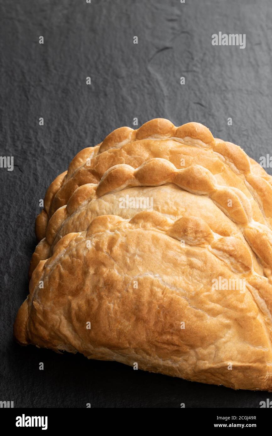 Homemade cornish pasty on stone background Stock Photo - Alamy