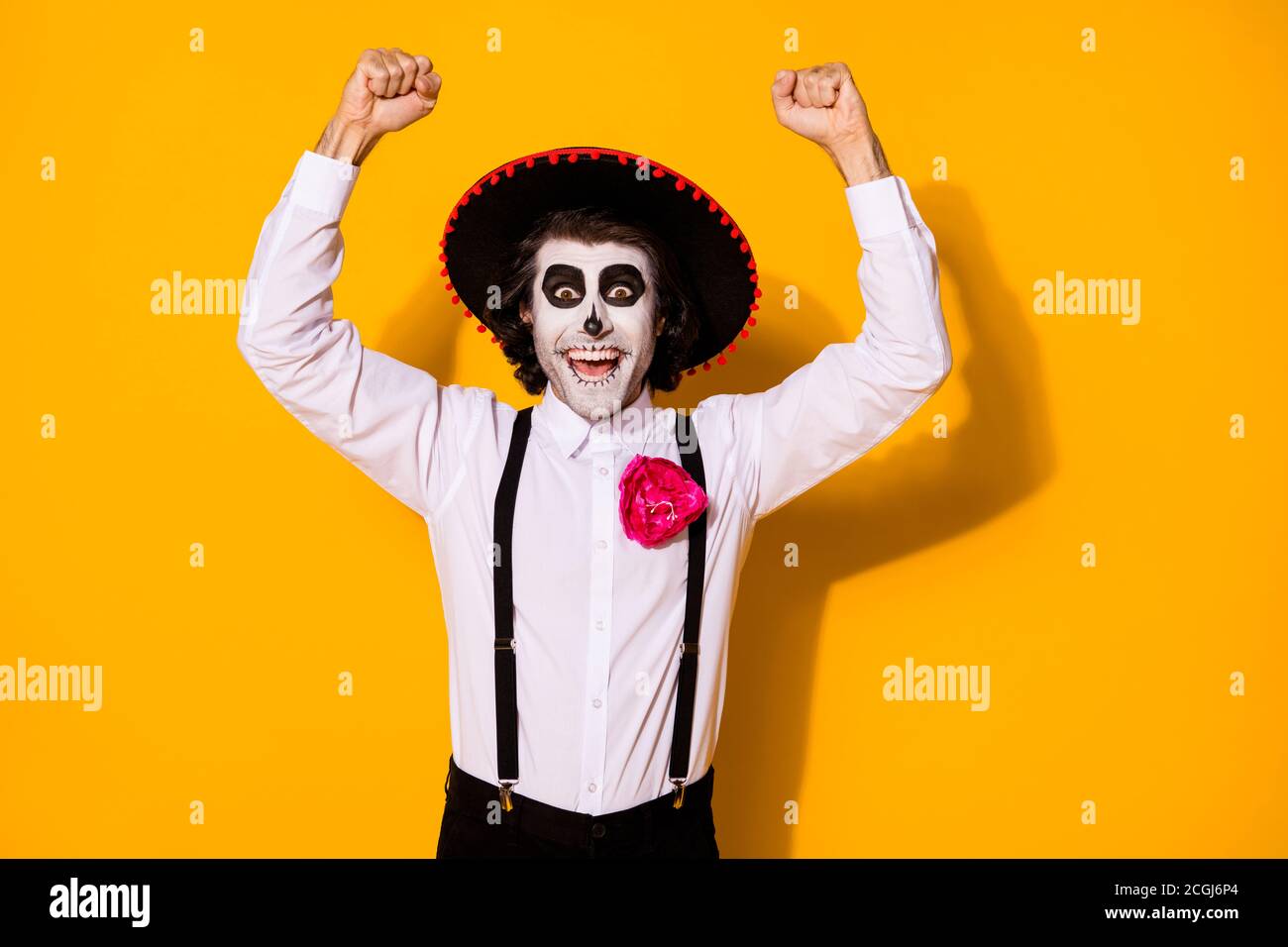 Photo of spooky monster guy raise hand fists winning huge prize ...