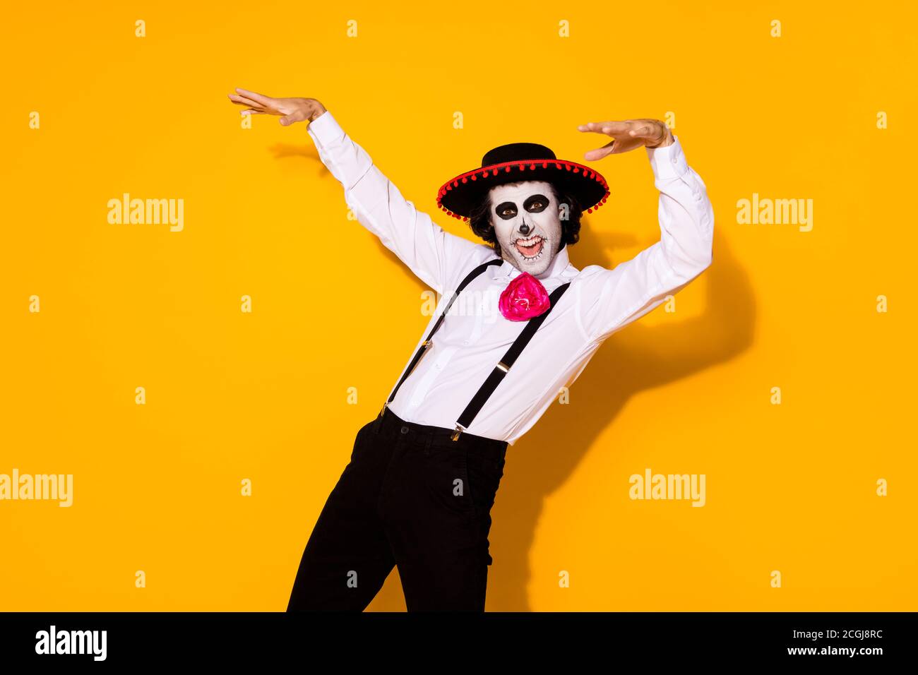 Photo of scary zombie creature guy jump scare raise pretend hands tree ...