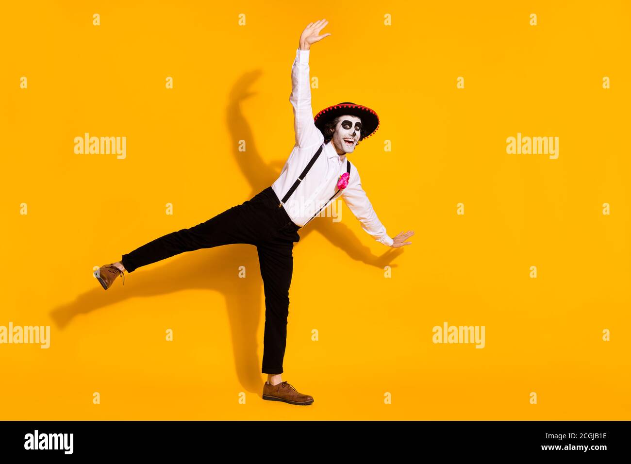 Full length photo of spooky zombie guy dance pretend fly airplane pose ...