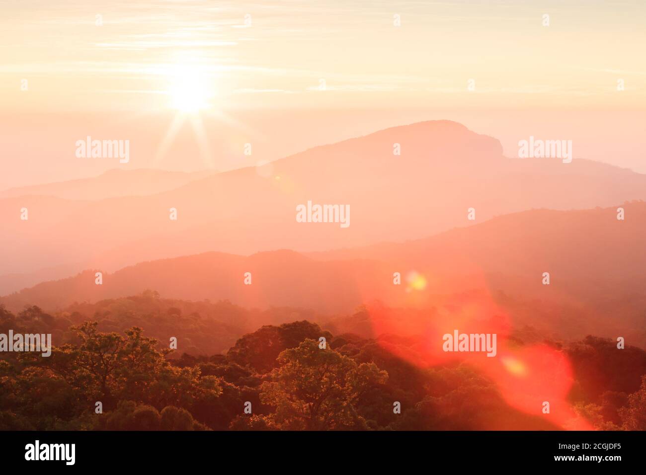 Glowing sunrise shines over mountains. Positive thinking concept Stock ...