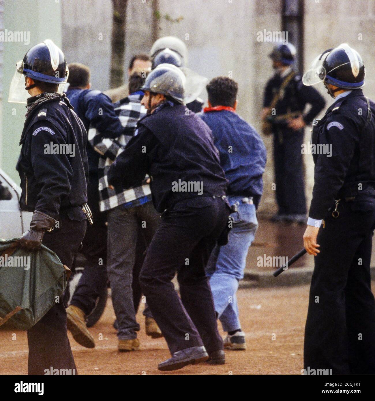 French riot police forces face young protesters demonstrating against ...