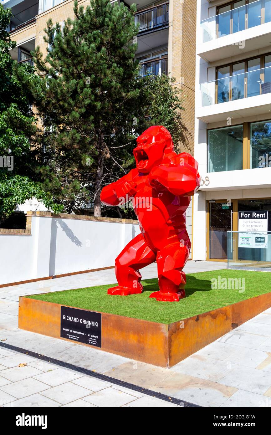 Sculpture of a red gorilla by French artist Richard Orlinski in Angel ...