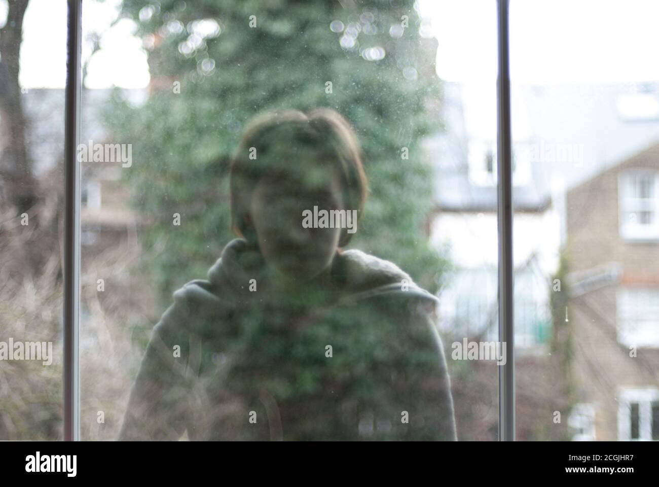 Ghostly woman in the reflection of a window Stock Photo - Alamy