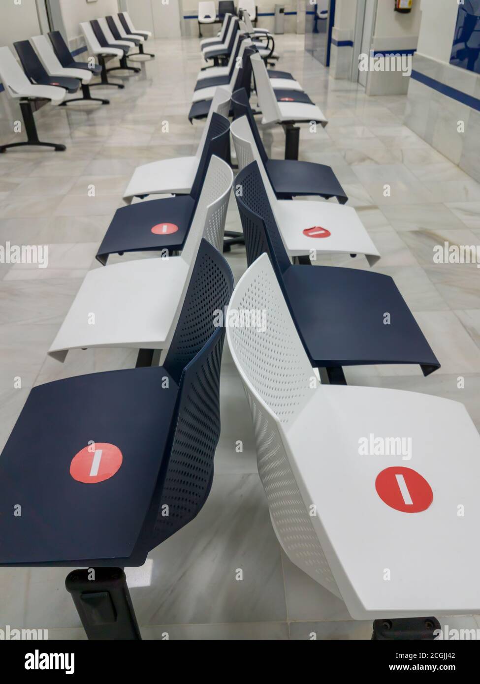 Social distancing. The waiting room of a hospital where is keeping ...