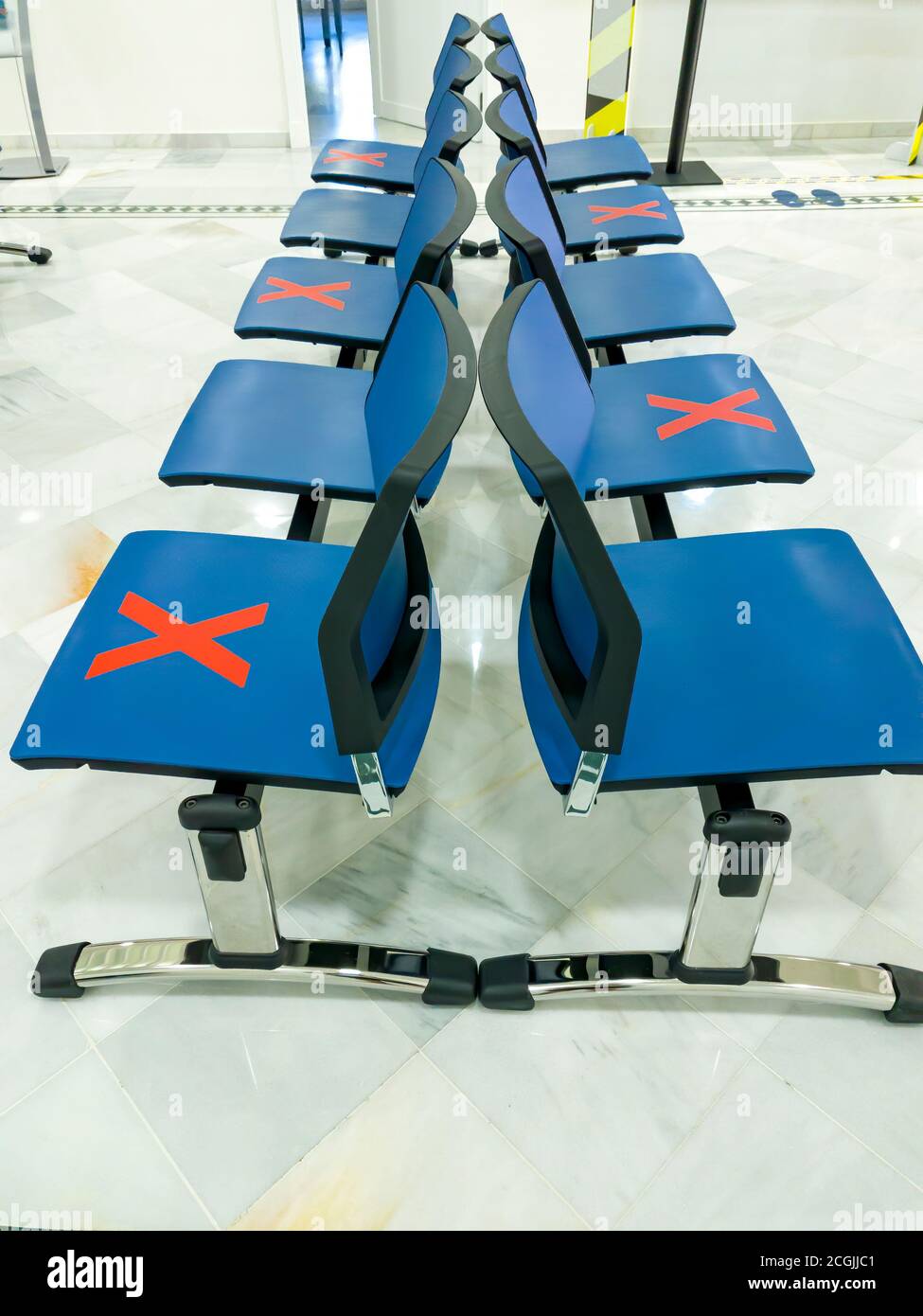 Social distancing. The waiting room of a hospital where is keeping ...
