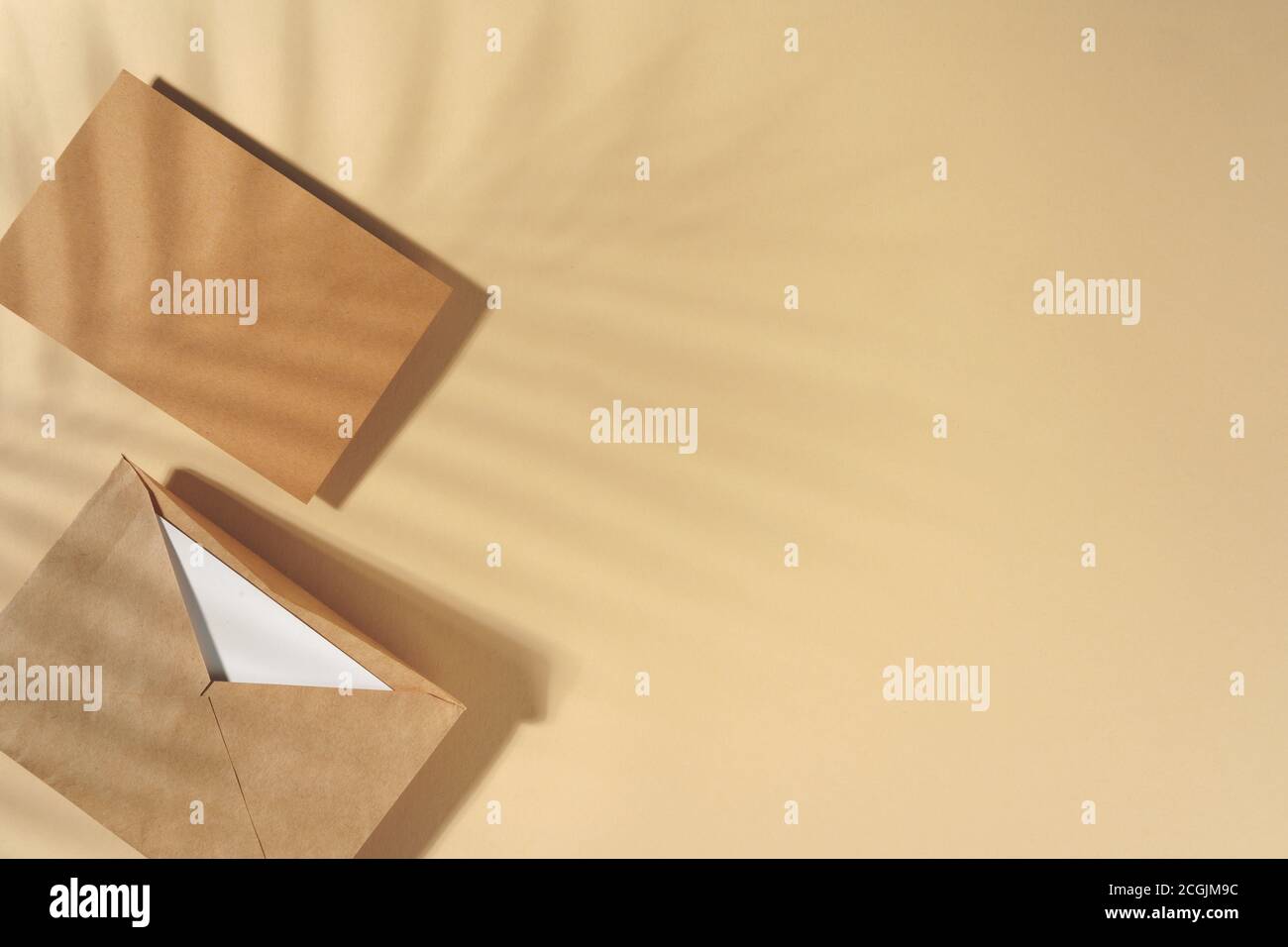 Craft paper letter on beige background top view Stock Photo - Alamy