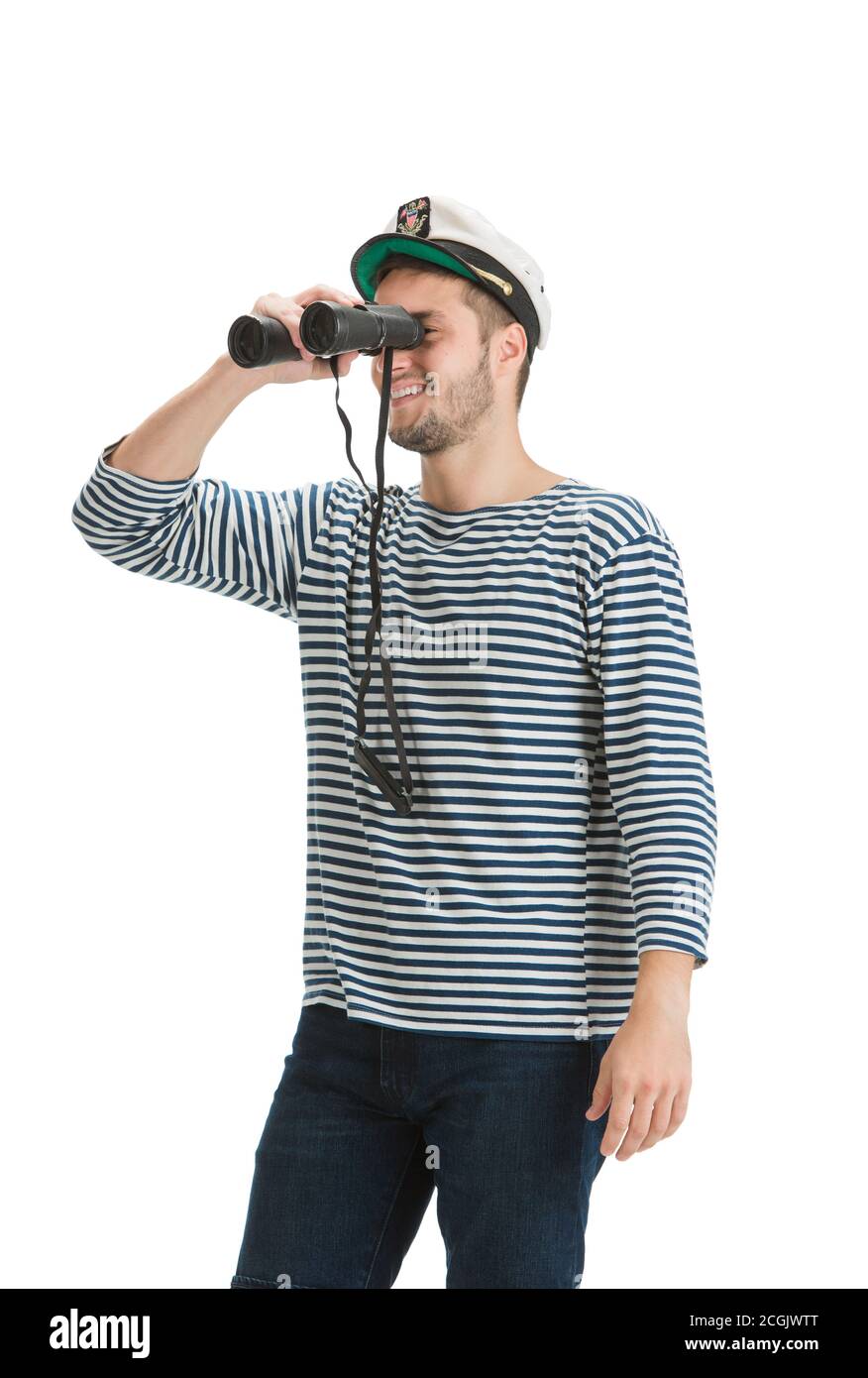 Holding binocular. Caucasian male sailor in uniform on white studio ...