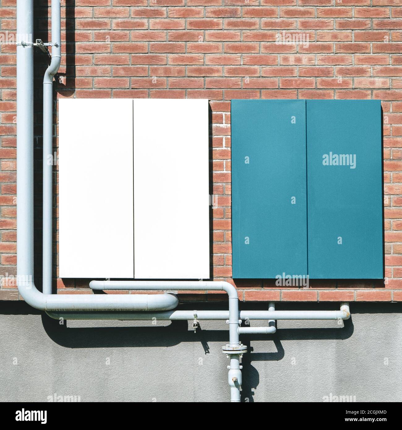 Outdoor gas pipeline and switchboard system on brick wall of ...