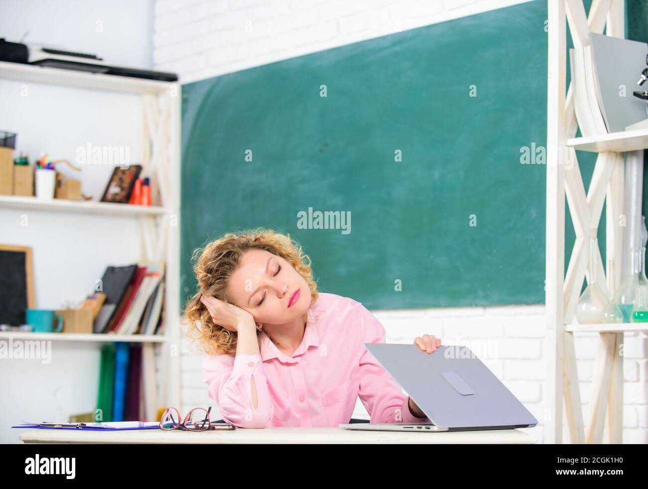 Exhausting lesson. Tired tutor fall asleep at workplace. Woman tired in ...
