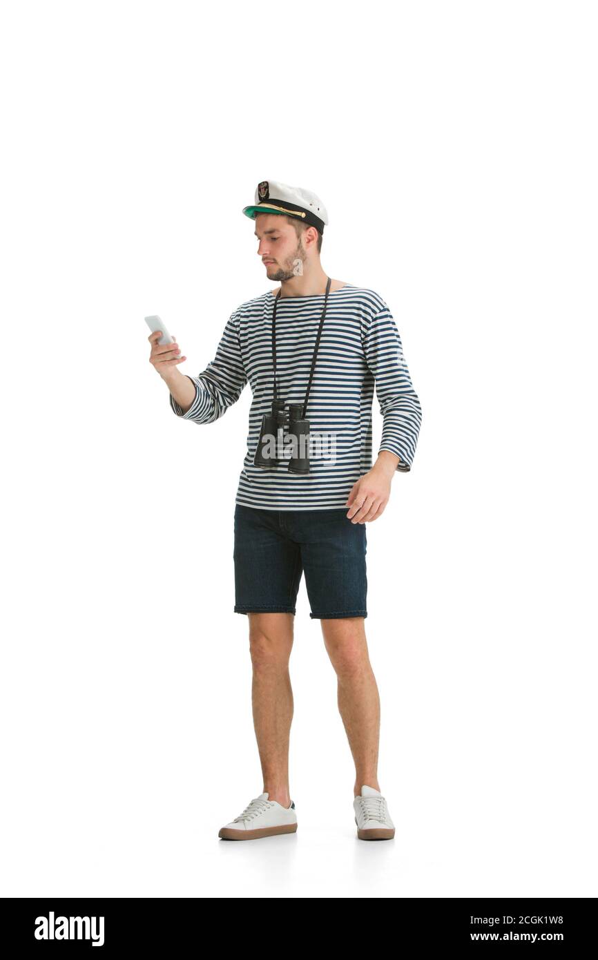 Hand scrolling phone on background Cut Out Stock Images & Pictures - Alamy