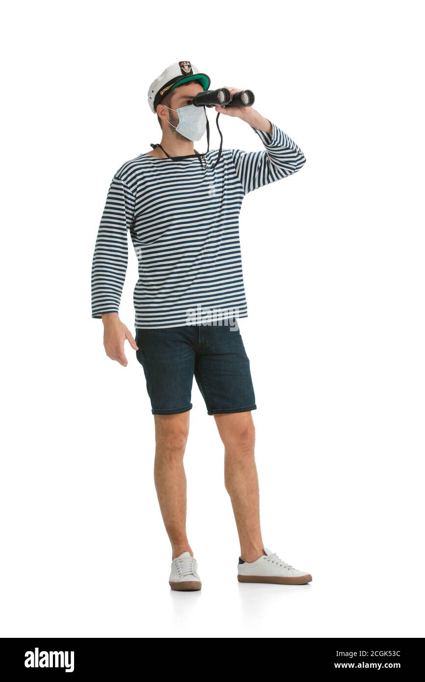 Prevention. Caucasian male sailor in uniform on white studio background ...