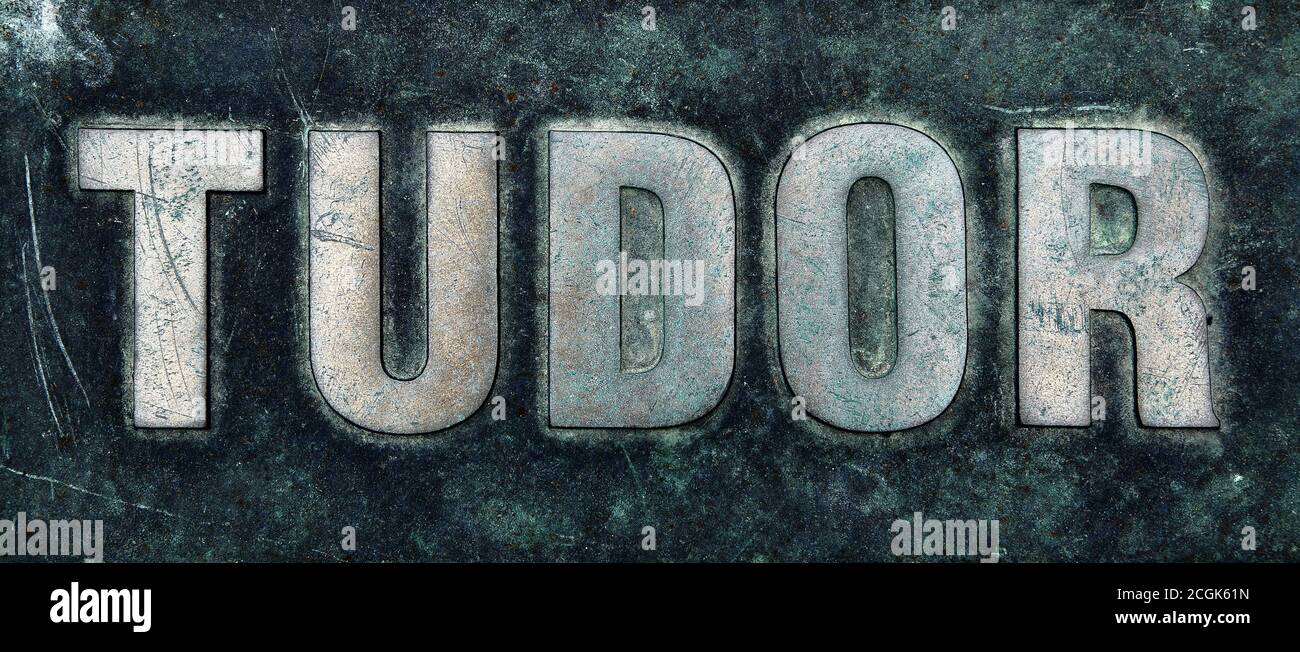 Tudor text embossed in bronze Stock Photo - Alamy