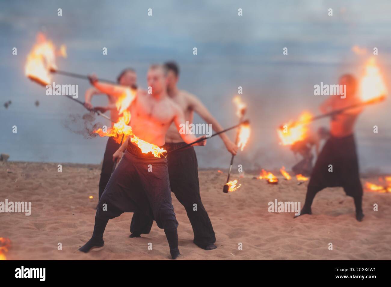 Group of fire artists fakir perform amazing show at night with ...