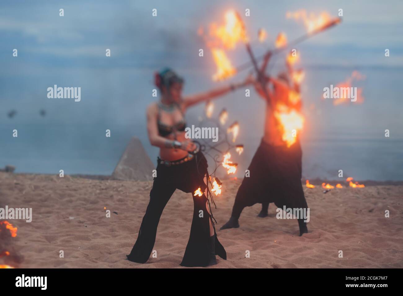 Group of fire artists fakir perform amazing show at night with ...