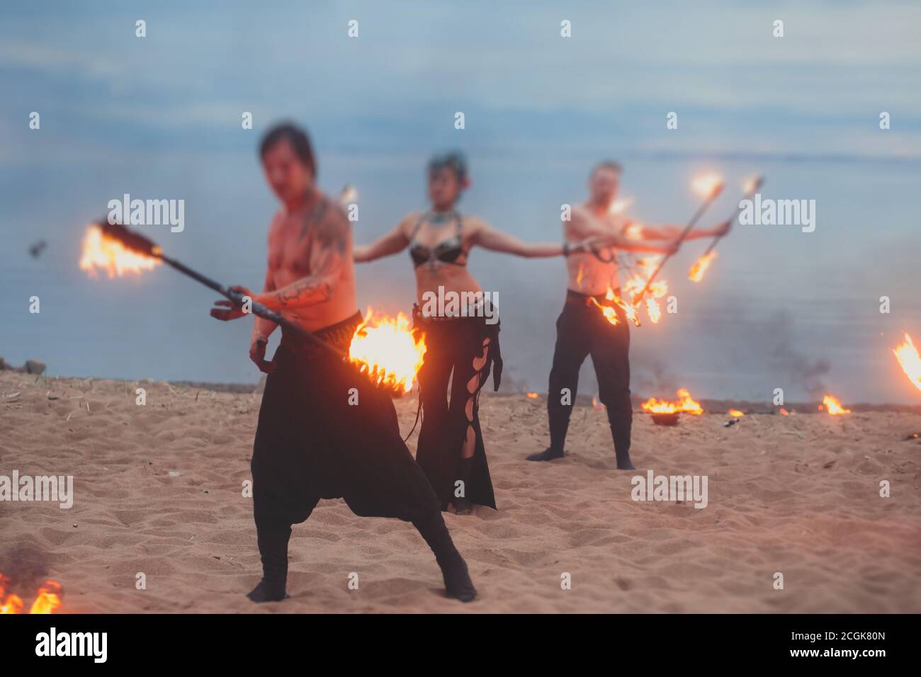 Group of fire artists fakir perform amazing show at night with ...