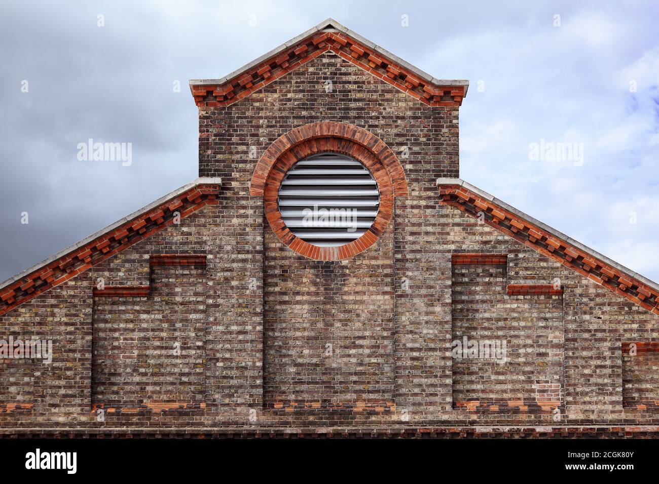 Victorian yellow and red brickwork on industrial factory building with ...