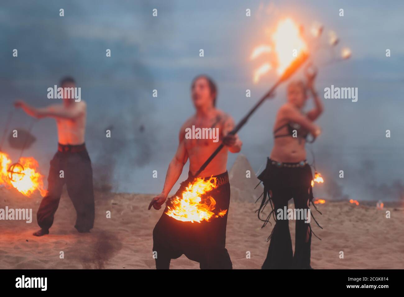 Group of fire artists fakir perform amazing show at night with ...
