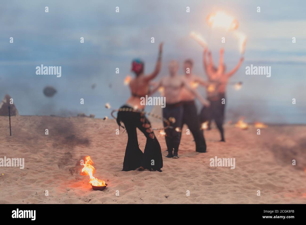 Group of fire artists fakir perform amazing show at night with ...